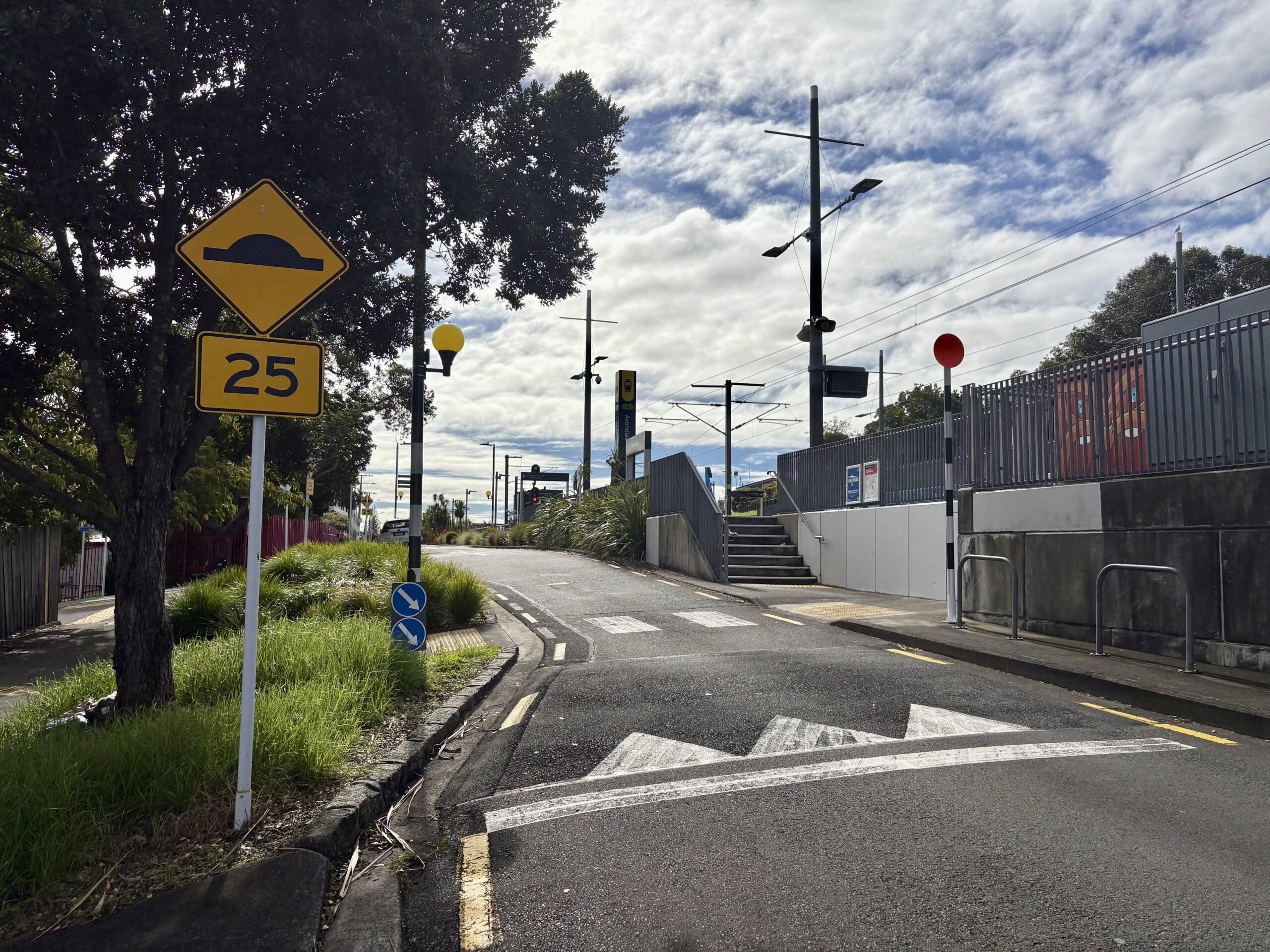 Layard St station entrance raised crossing bike parking 25kmh advisory ...